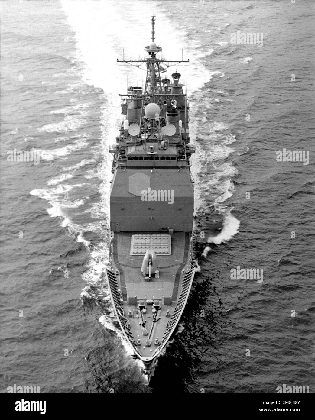 A high oblique bow on view of the guided missile cruiser USS PORT ROYAL ...