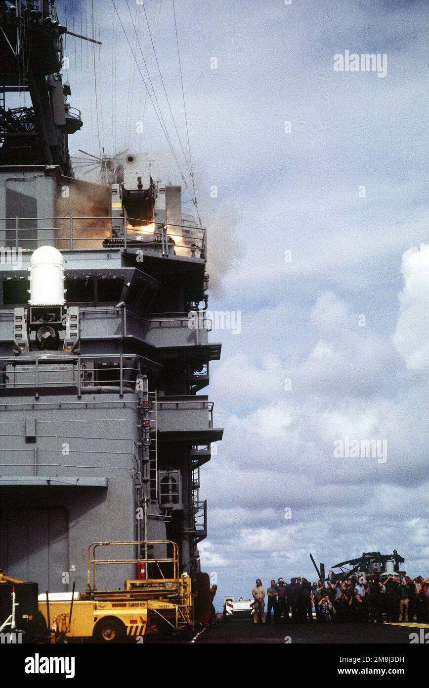 A Rolling-Airframe-Missile (RAM) is fired from atop the forward island ...