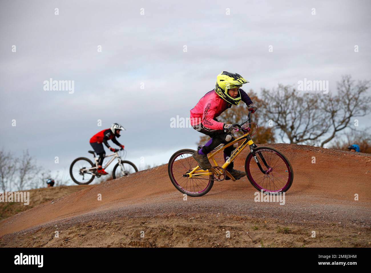 Mountain bike riders in action at a BMX and pump track near Fleet in ...