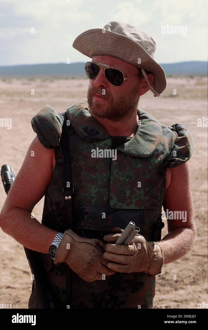 A portrait of an explosive ordnance person or soldier. Subject ...