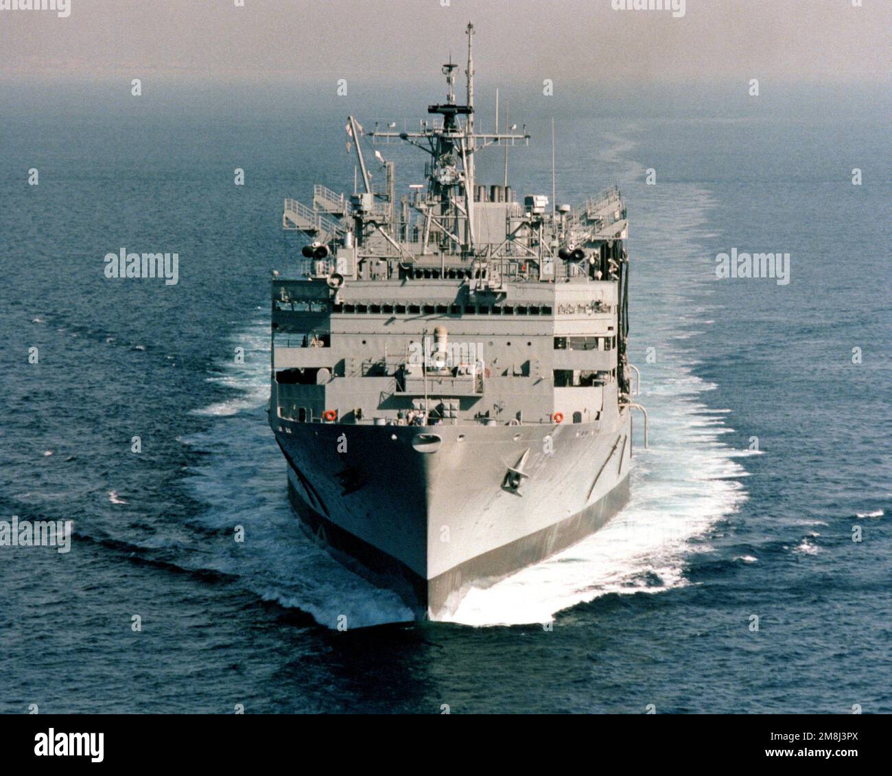 Bow on view of the fast combat support ship USS SUPPLY (AOE-6) underway ...