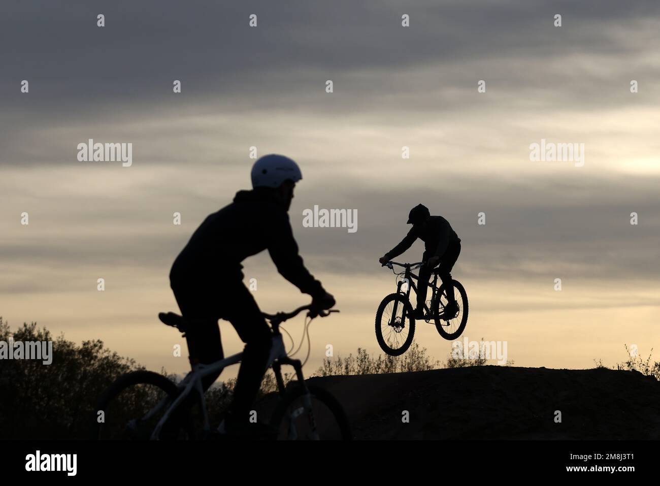 Mountain bike riders in action at a BMX and pump track near Fleet in ...