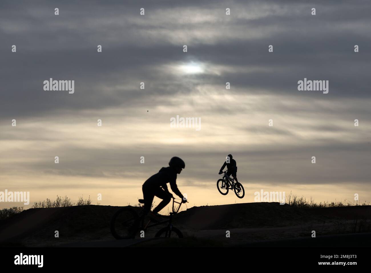 Mountain bike riders in action at a BMX and pump track near Fleet in ...