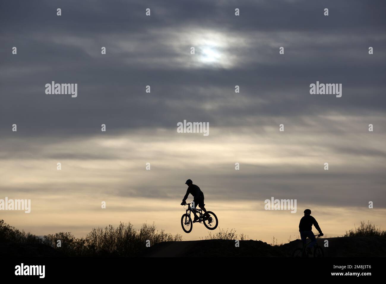 Mountain bike riders in action at a BMX and pump track near Fleet in ...