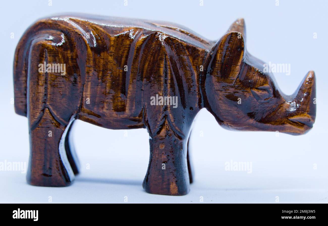hand made wooden rhino showpiece for decoration Stock Photo - Alamy