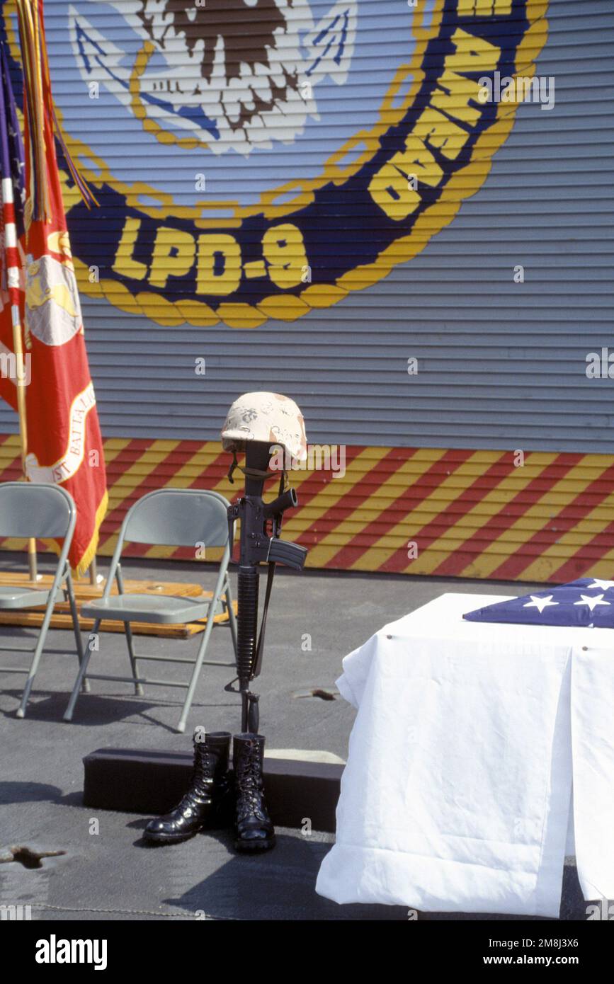 The Field Memorial for a fallen comrade - boots, helmet, and weapon ...
