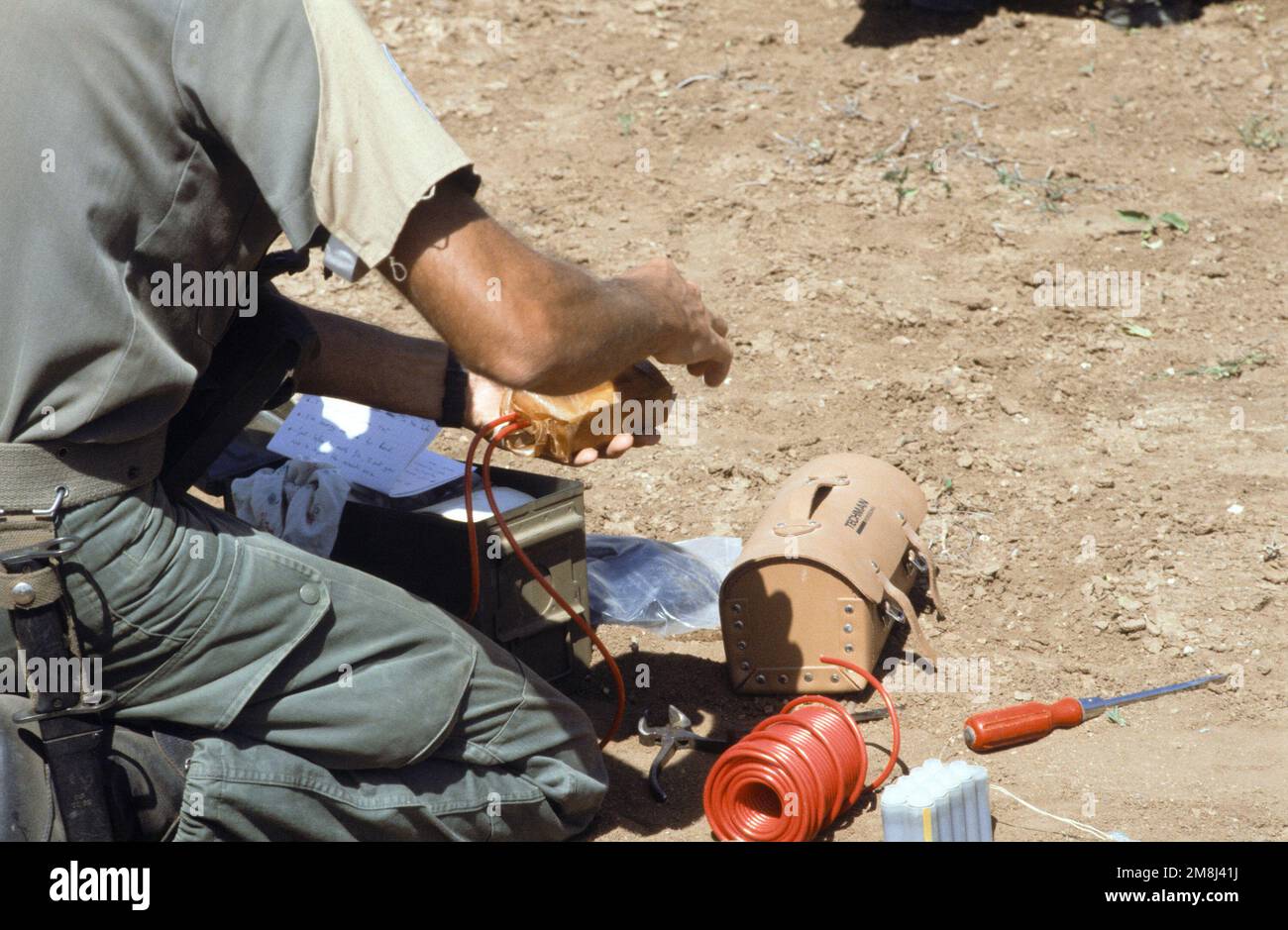 A demonstration in ordnance disposal is conducted by French soldiers ...