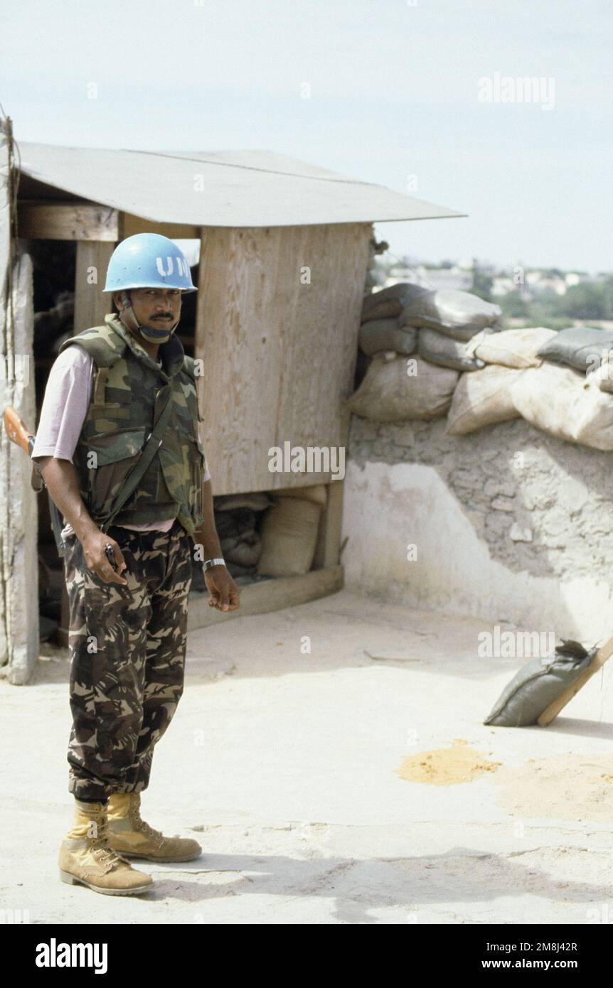 A Bangladeshi soldier stands guard outside of the K-4 Circle compound ...
