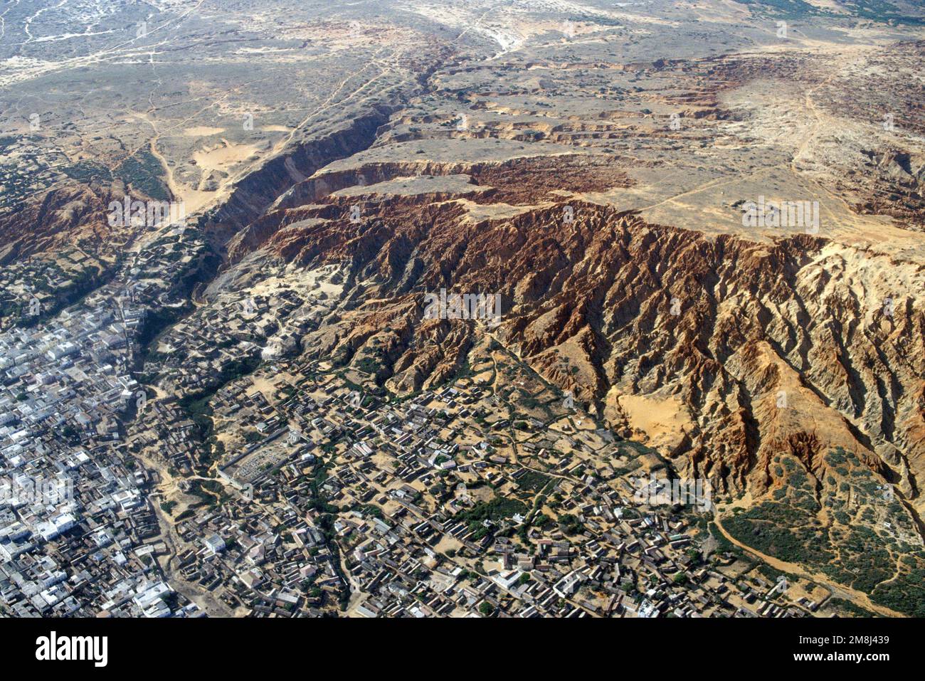 An aerial view of the Somali landscape shows a Somalian city at the ...