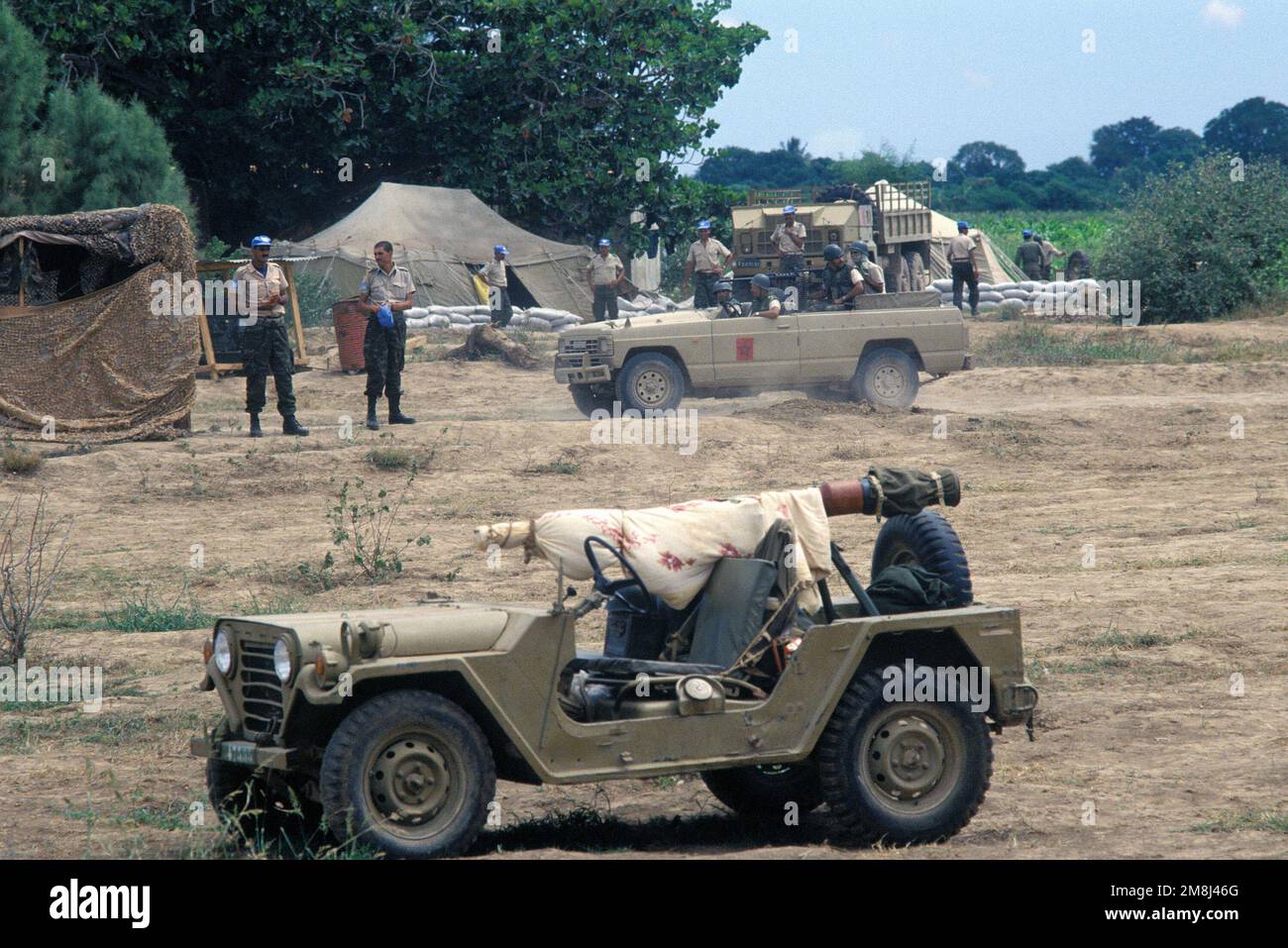 Moroccan jeeps, armed with tow missiles, and personnel prepare to ...