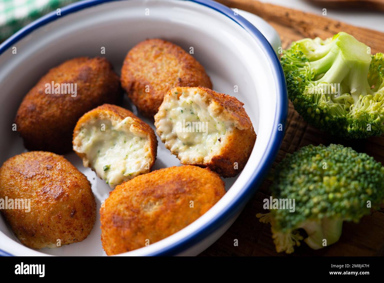 Broccoli croquette. The croquette is a portion of dough made from a ...