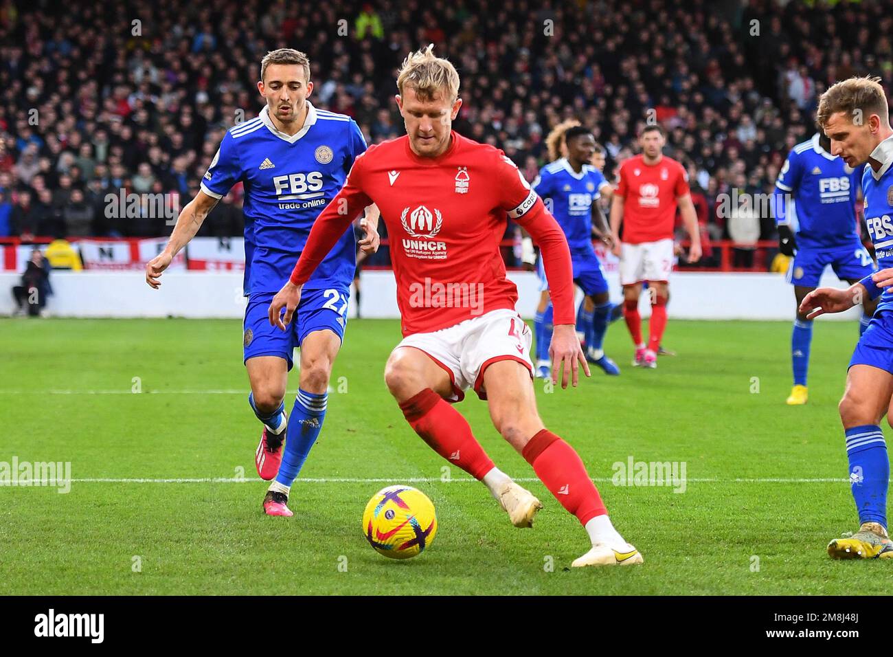 Joe Worrall of Nottingham Forest under pressure from Marc Albrighton of ...