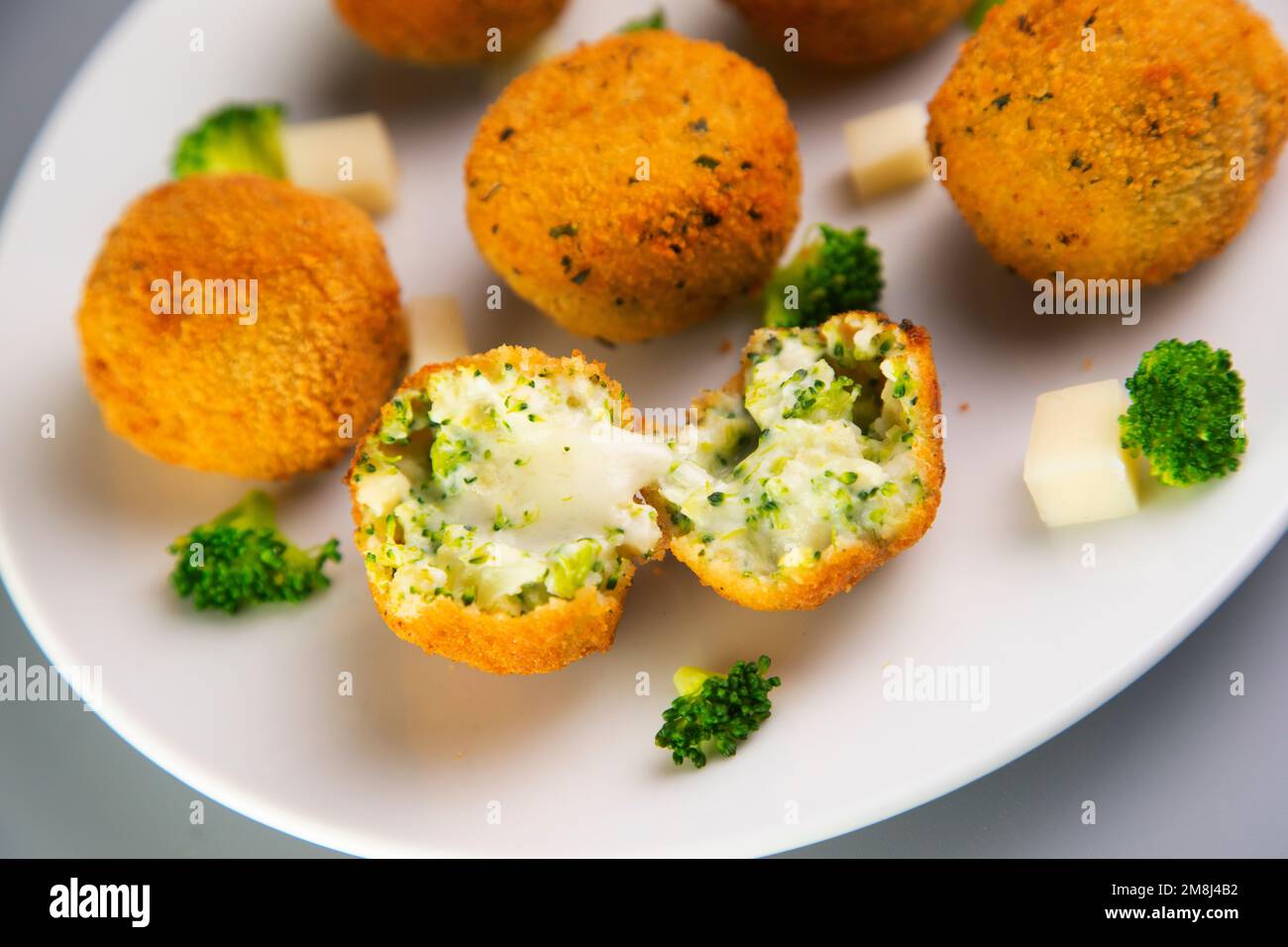 Broccoli croquette. The croquette is a portion of dough made from a ...