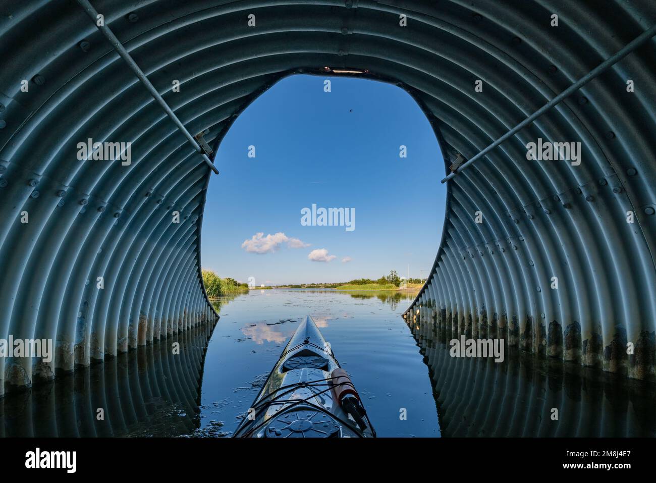 Kayaking under a road at Kökar island, Ahvenanmaa, Finland Stock Photo ...