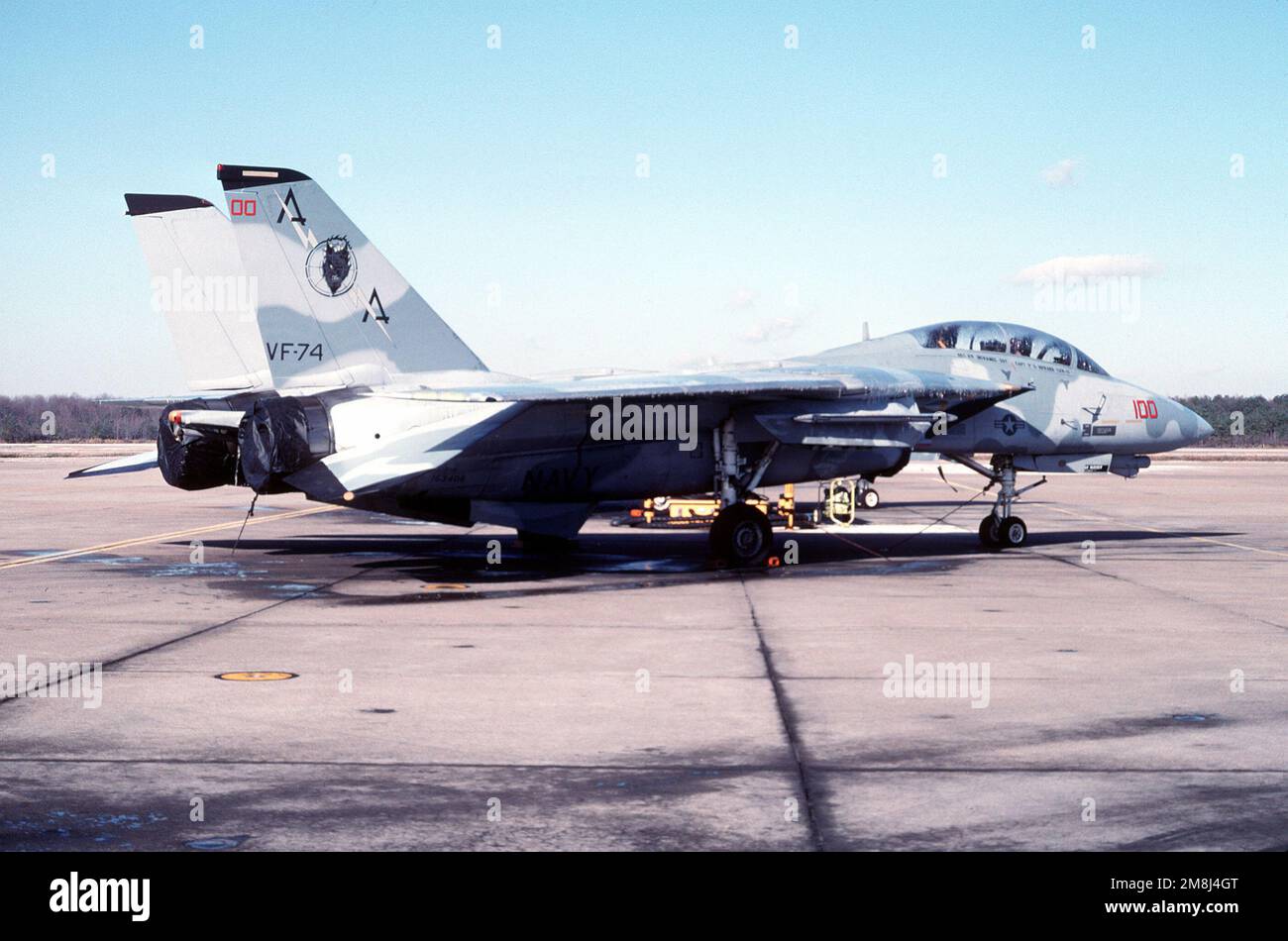 A right rear view of an F-14B Tomcat aircraft of Fighter Squadron 74 ...
