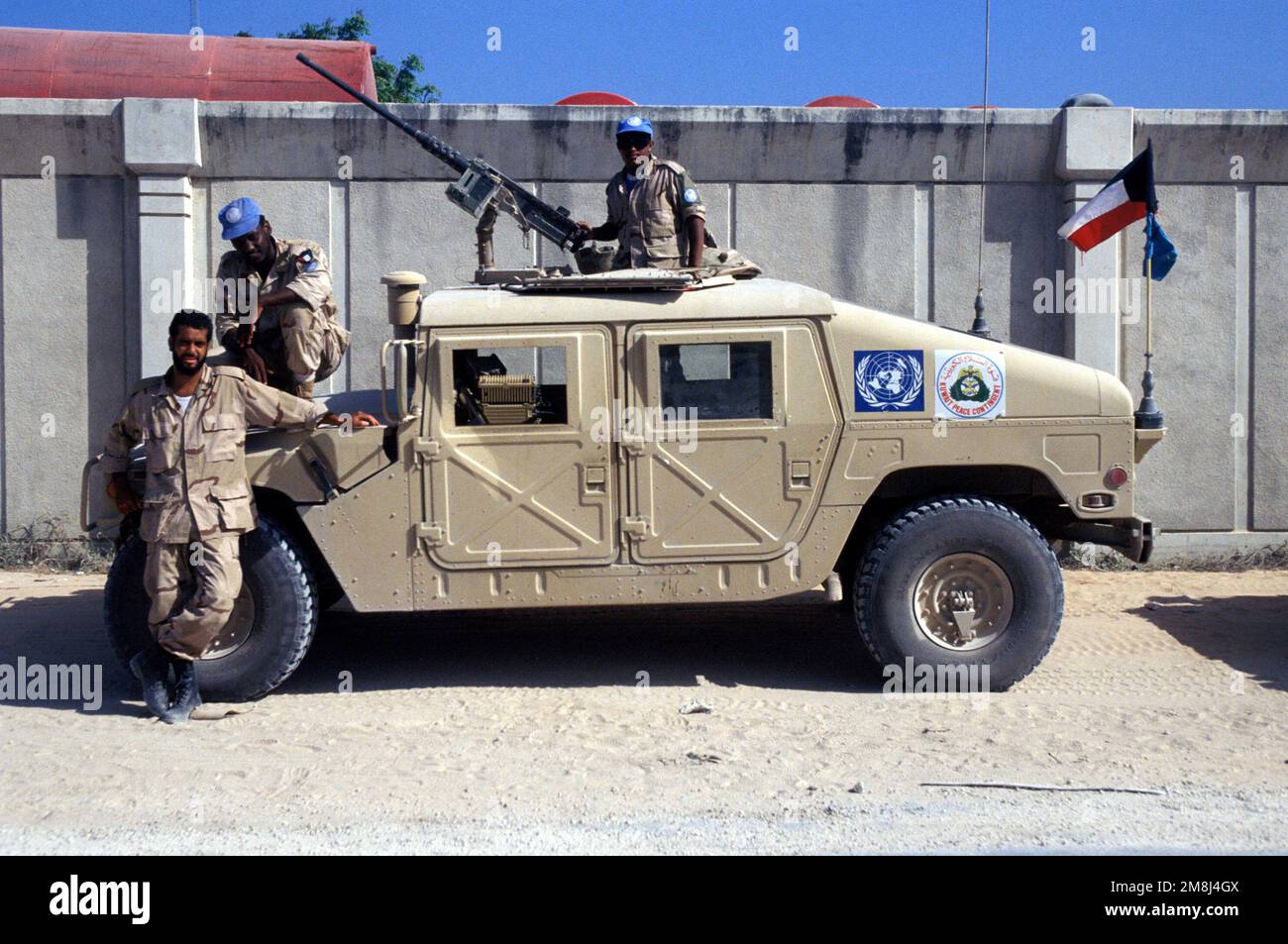 Kuwaiti soldiers pose around their High-Mobility Multipurpose Wheeled ...