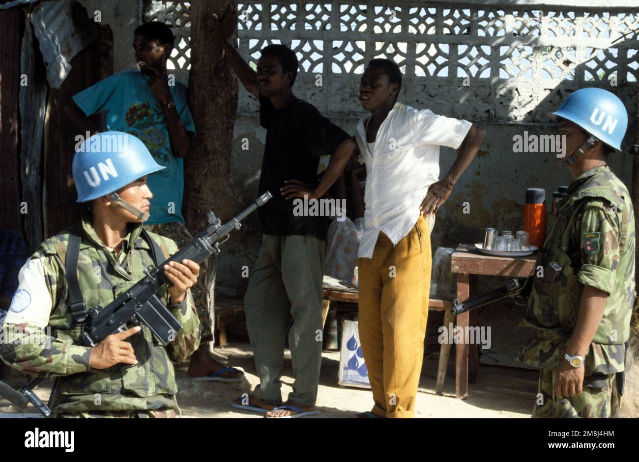 A member of the Nepalese Quick Reactionary Force (QRF) stands ready ...