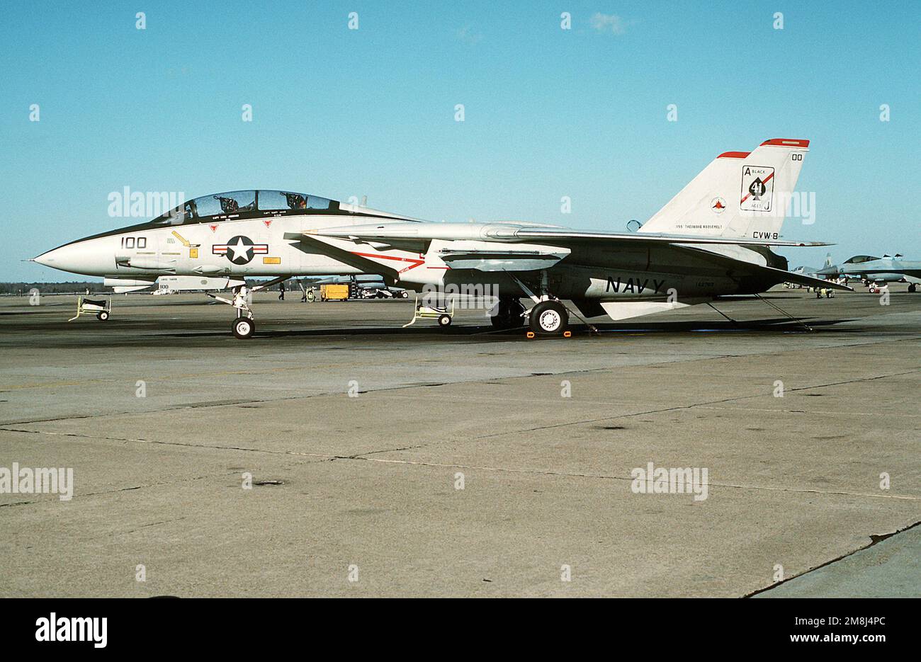 A left side view of an F-14A Tomcat aircraft of Fighter Squadron 41 (VF-41) parked on the flight ...