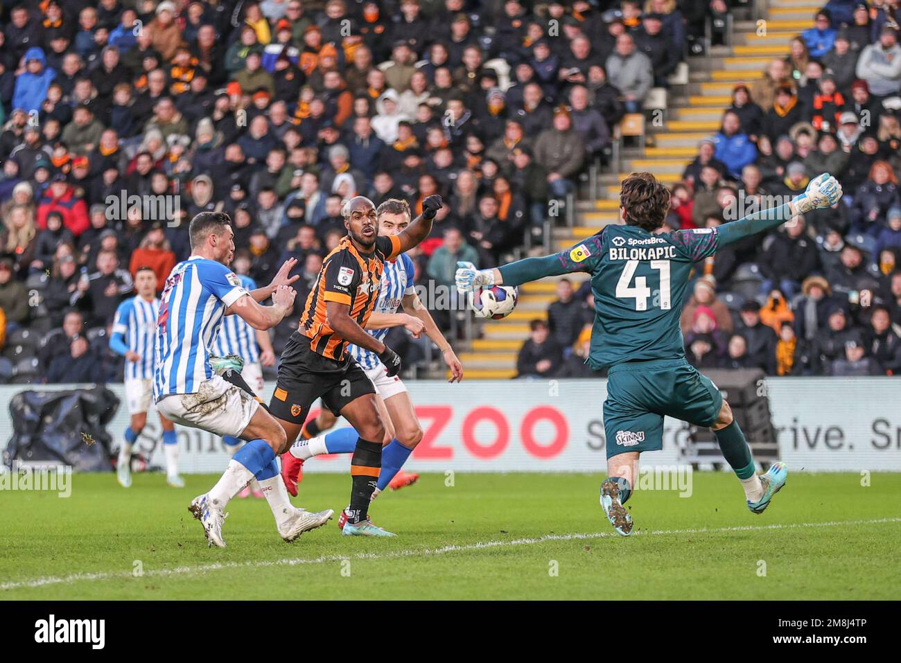 Nicholas Bilokapic #41 of Huddersfield Town blocks a shot from Óscar ...