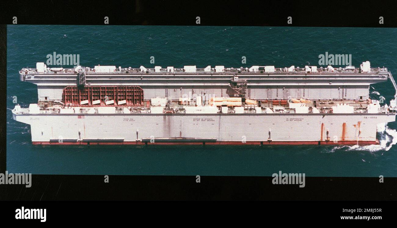 The Russian floating dry dock PD-0002, under tow, with a cargo of ...