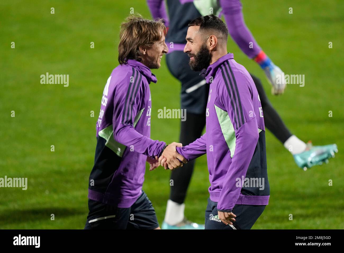 Real Madrid's Karim Benzema, right, shakes hands with teammate Luka ...