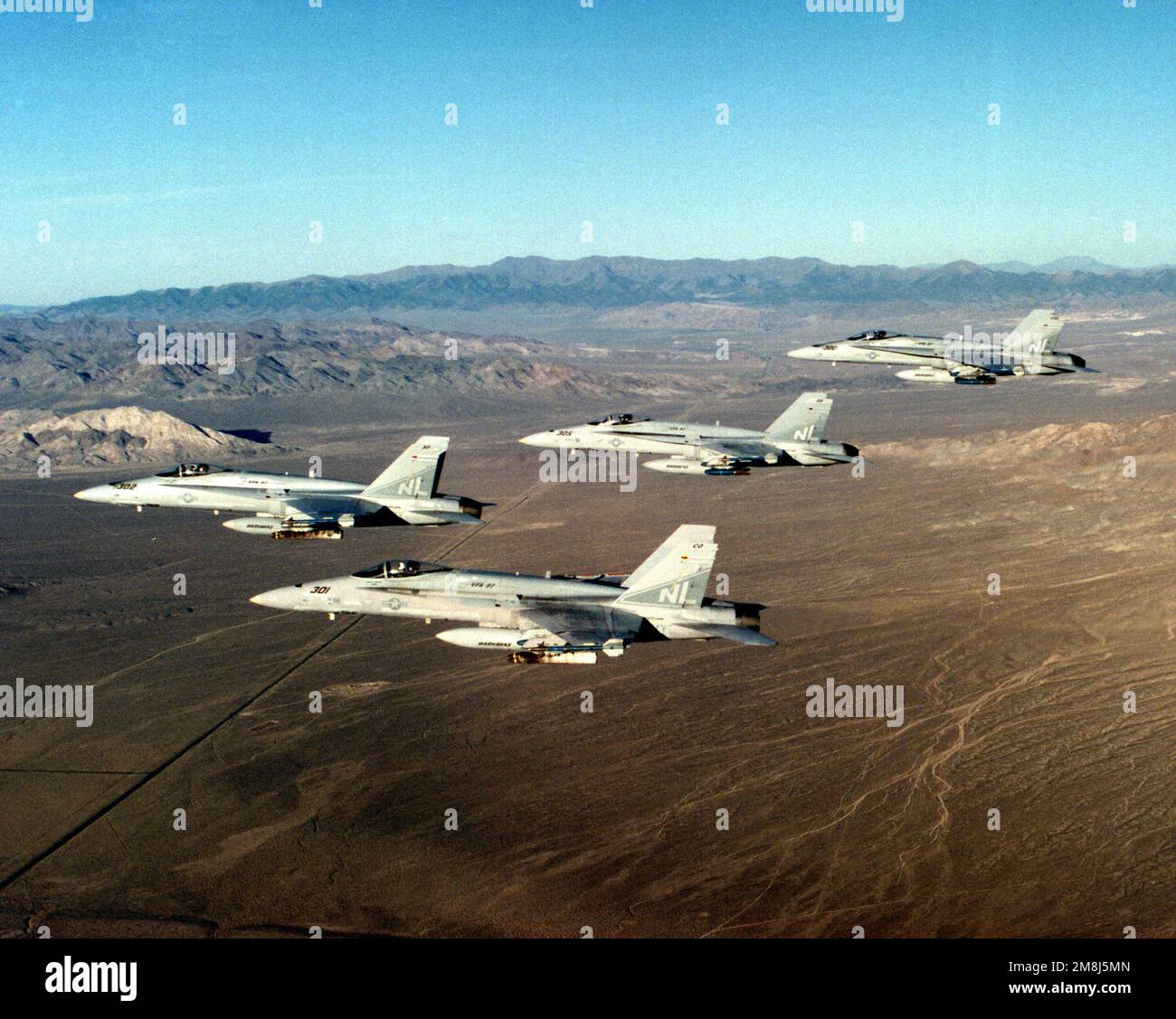 Four F/A-18C Hornet aircraft of Strike Fighter Squadron 97 (VFA-97 ...