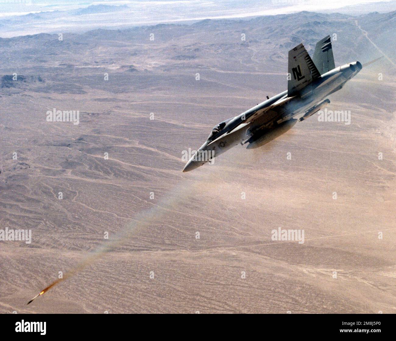 An F/A-18C Hornet aircraft of Carrier Wing Fifteen (CVW-15) assigned to ...