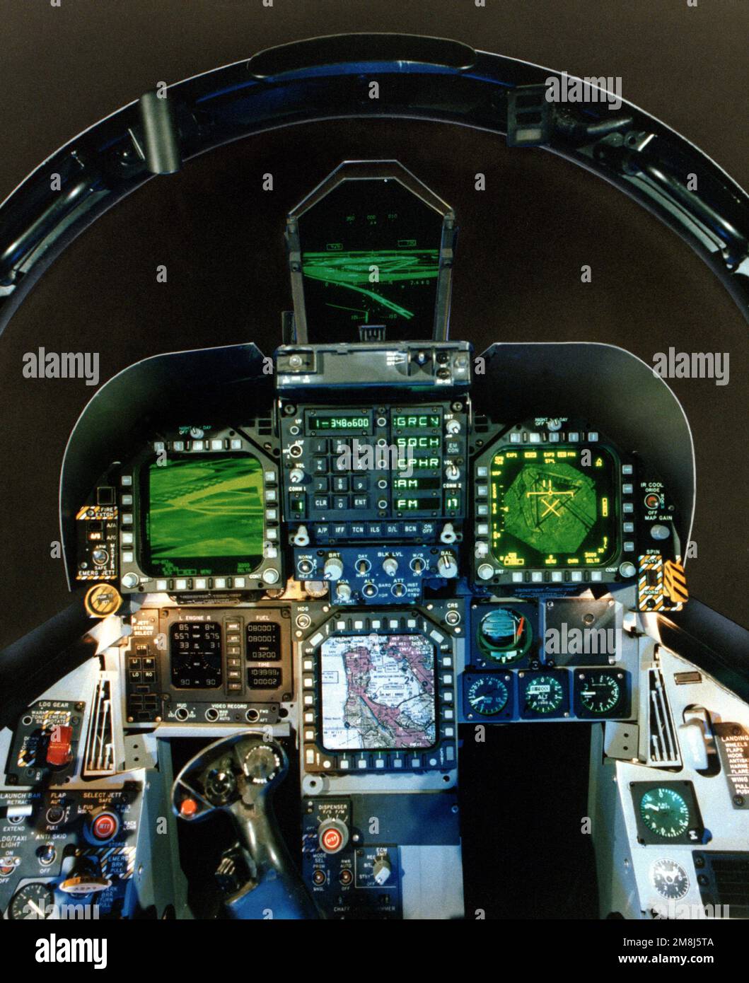 Cockpit of an F/A-18C Hornet aircraft simulator showing the night ...