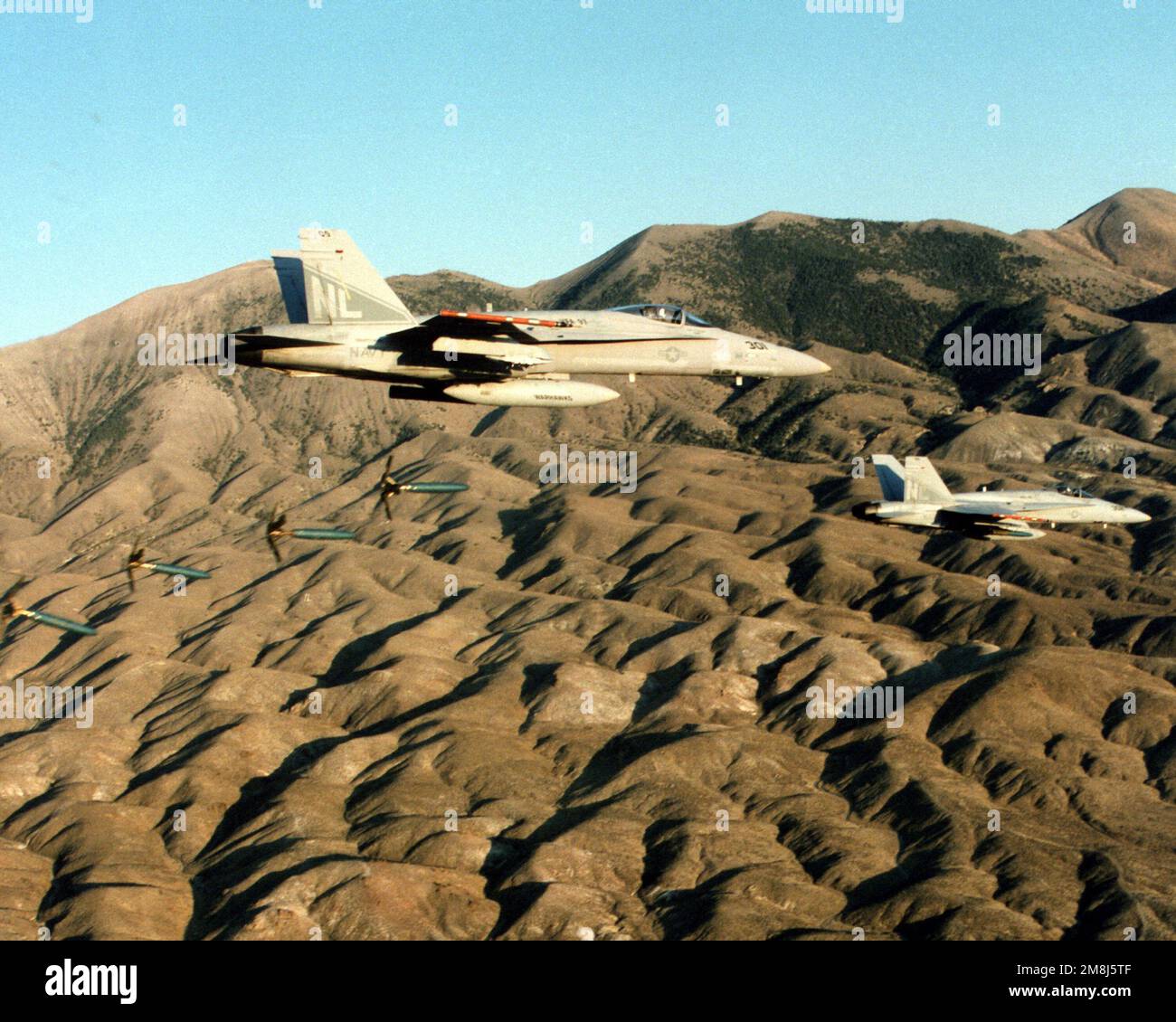 Two F/A-18C Hornet aircraft of Strike Fighter Squadron 97 (VFA-97 ...