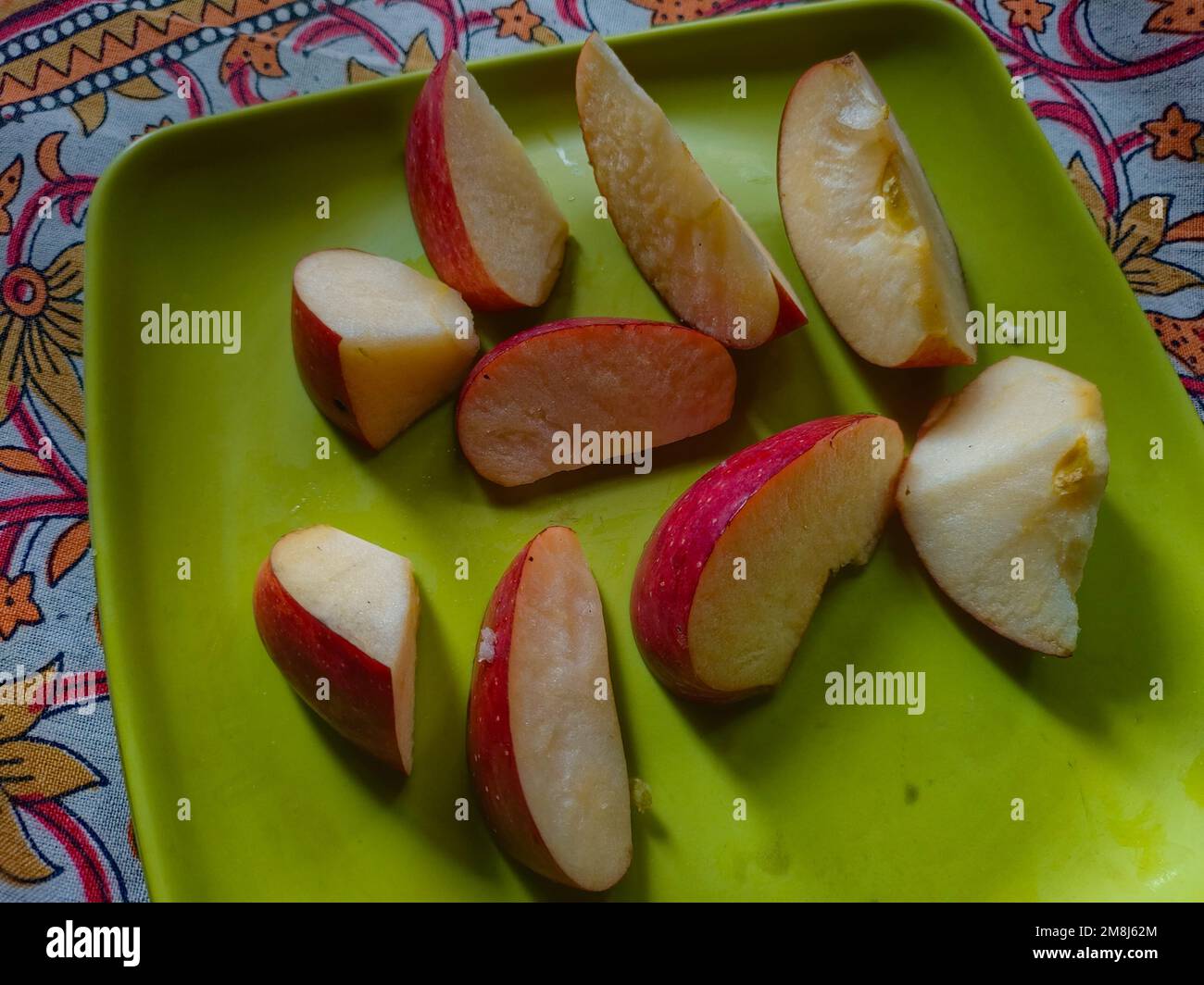 Cut into pieces green apple hi-res stock photography and images - Alamy