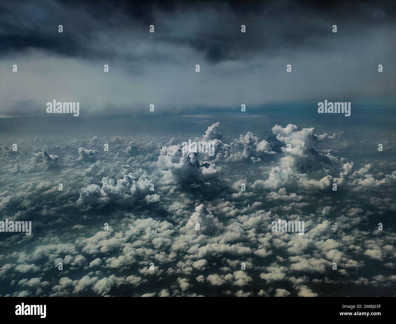 white clouds seen from aeroplane window aerial view Stock Photo - Alamy
