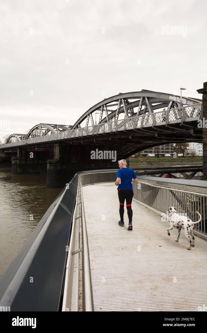 London, England, UK. 14 January 2023. The Barnes Bridge Walkway under ...