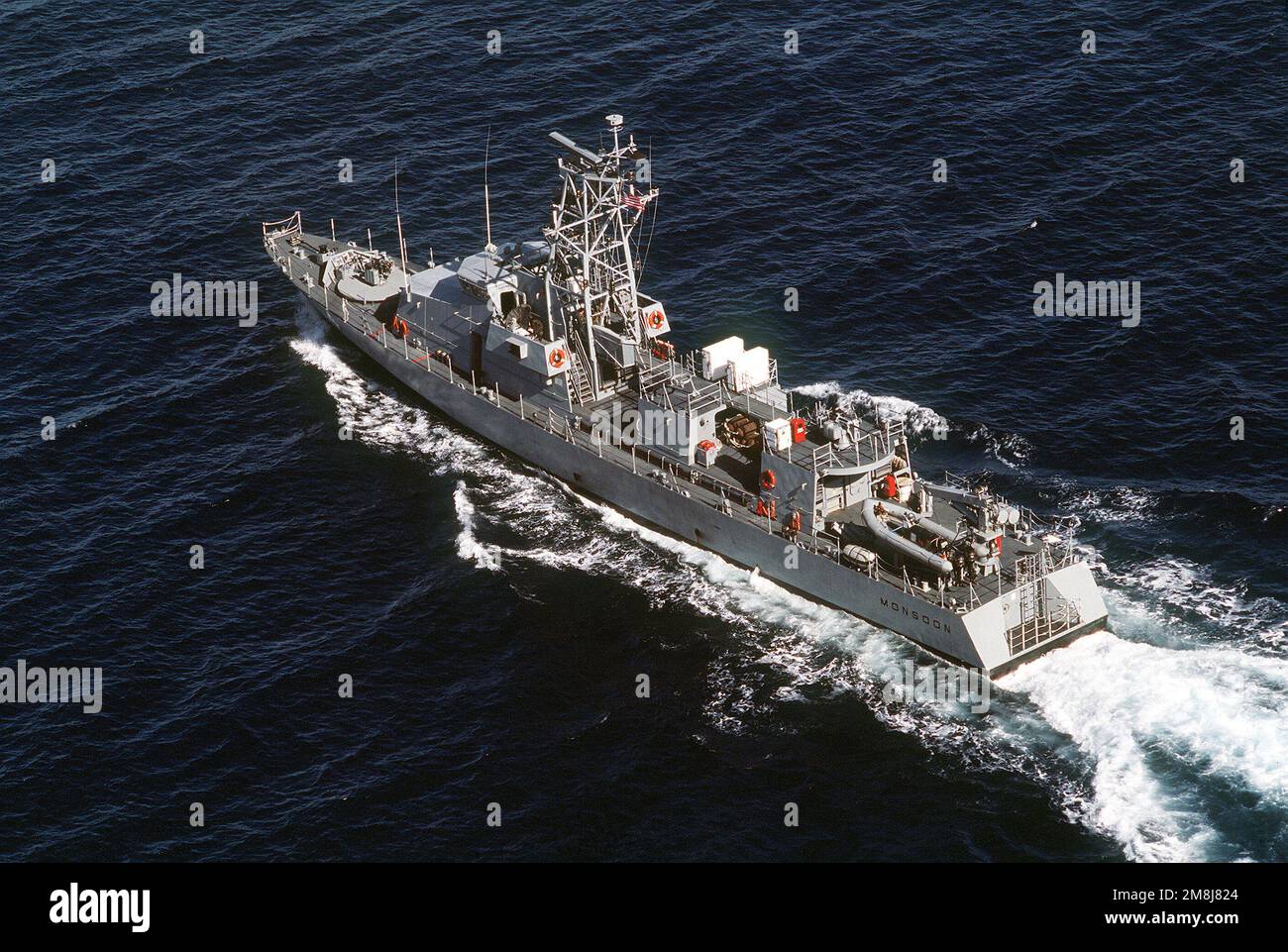 Aerial port quarter view of the patrol craft USS MONSOON (PC-4 ...