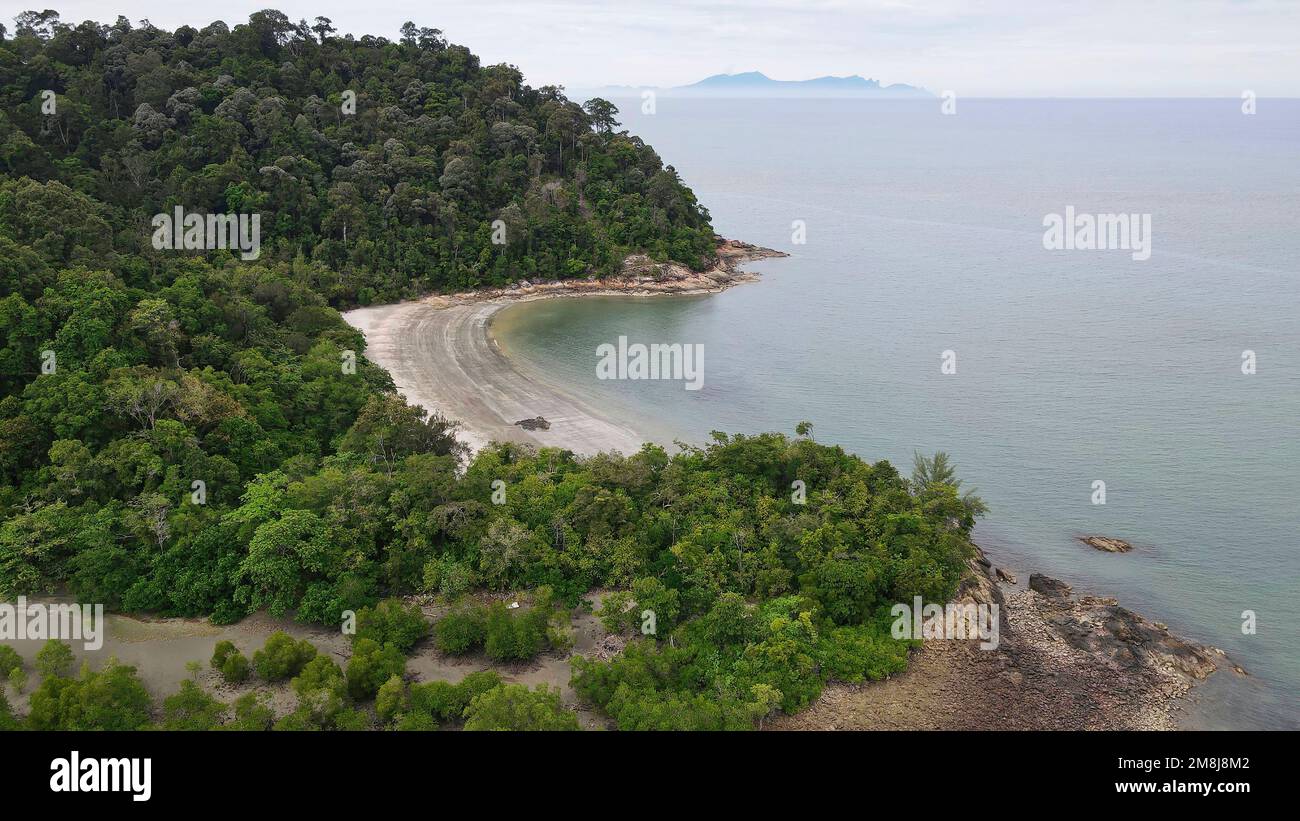 A beautiful landscape of an empty beach with tropical forests Stock ...