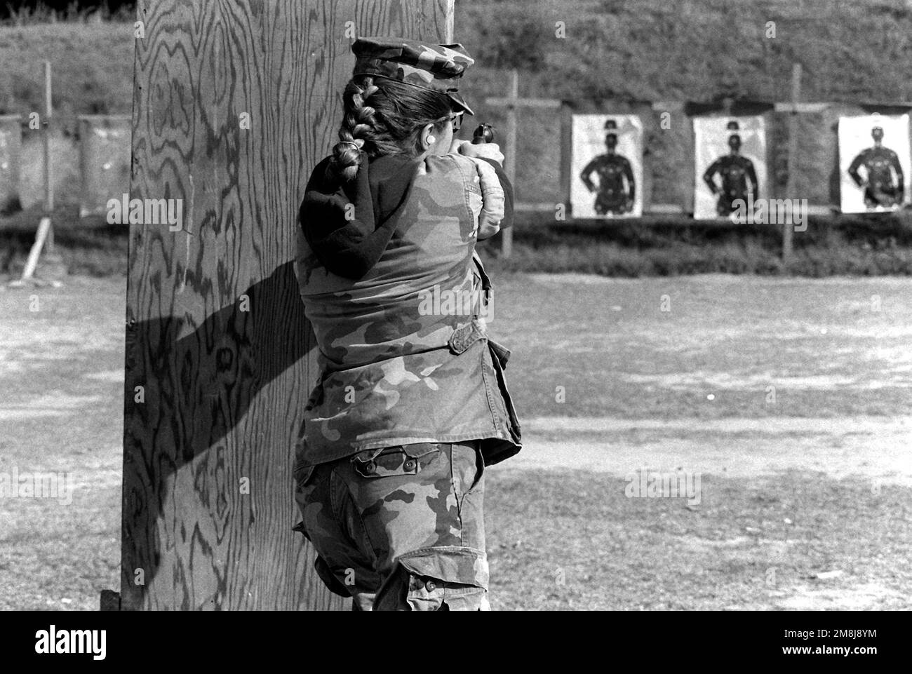 Photographers Mate Third Class (PH3) April Hatton, a photojournalist ...