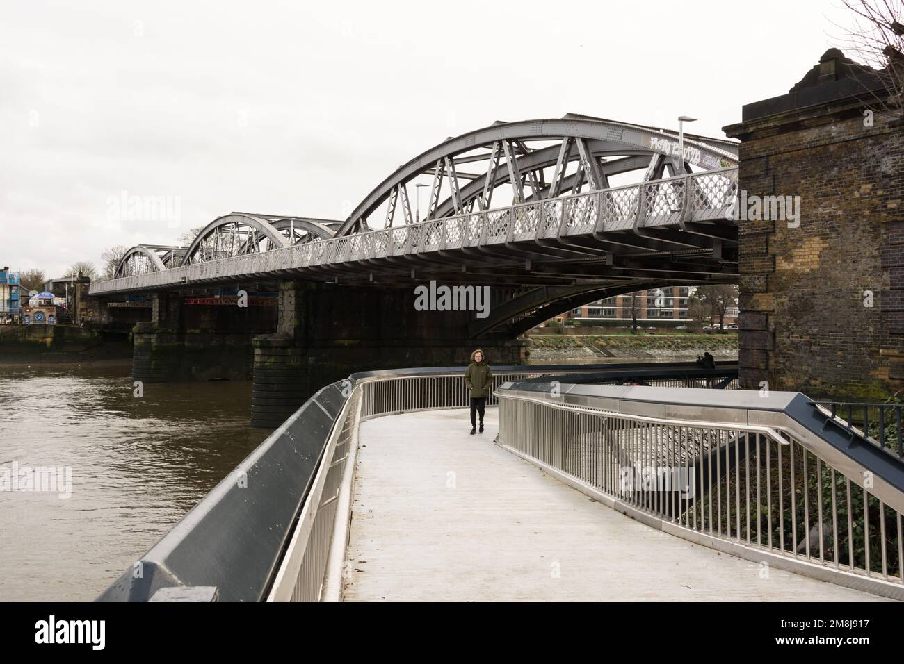 London, England, UK. 14 January 2023. The Barnes Bridge Walkway under ...