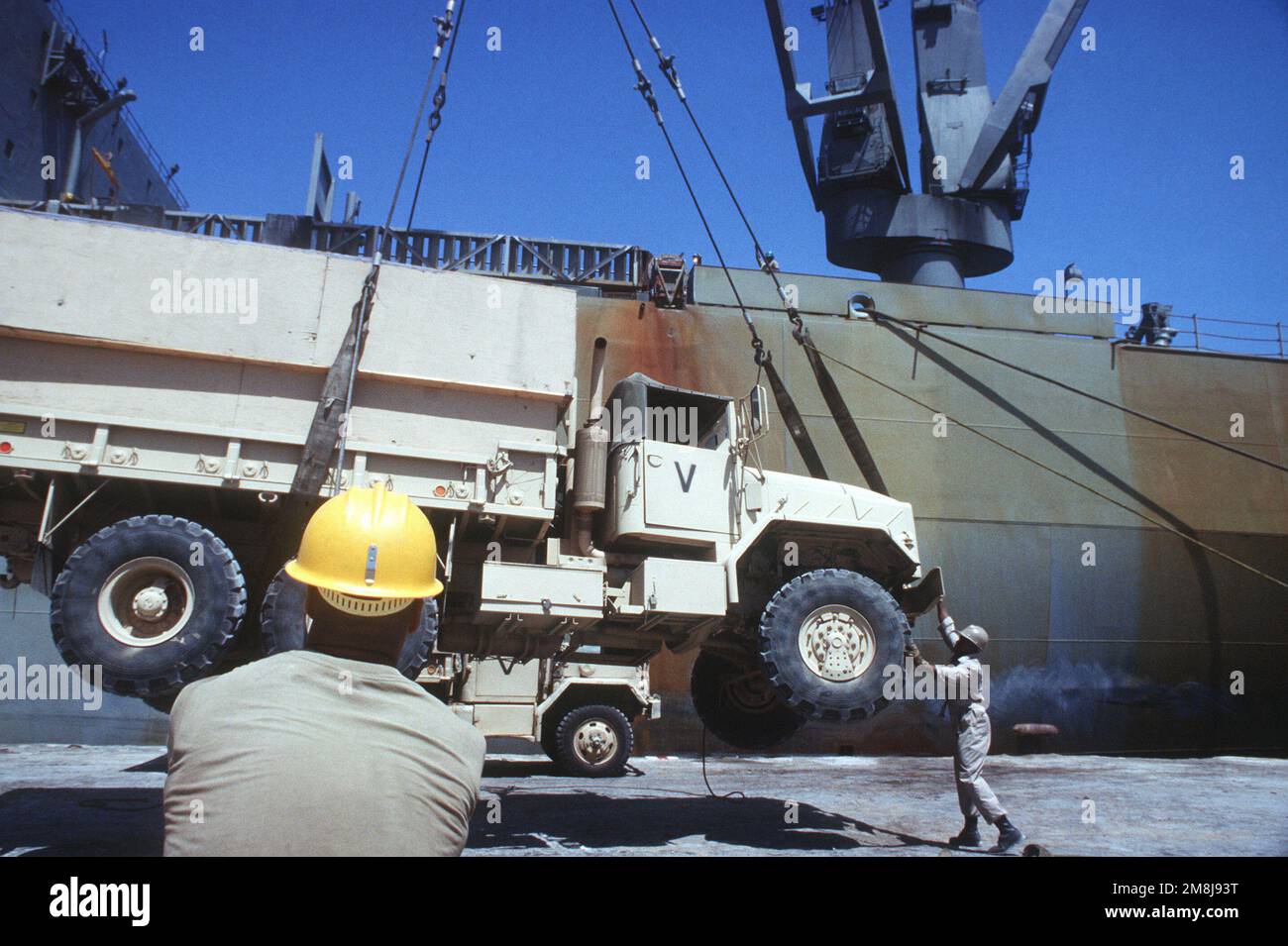 The 155th Transportation Company, Fort Eustis, VA, load an M9A9 5-ton ...