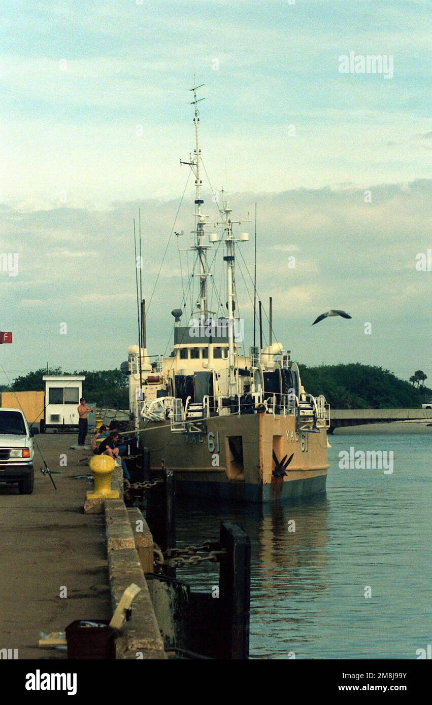 A bow on view of the miscellaneous auxiliary yard craft MONOB ONE (YAG-61) tied up at a pier ...