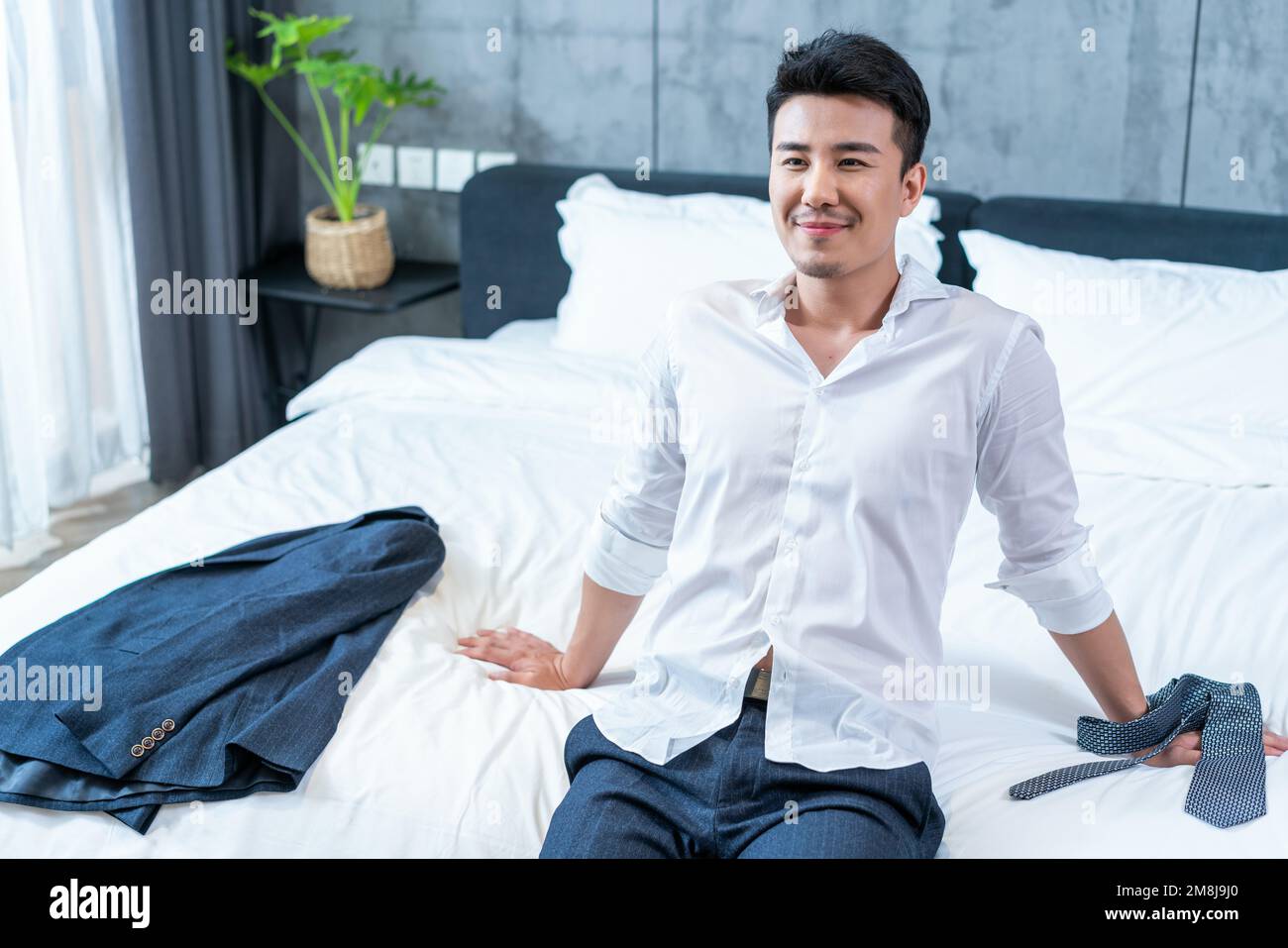 Business man in the hotel to rest Stock Photo - Alamy