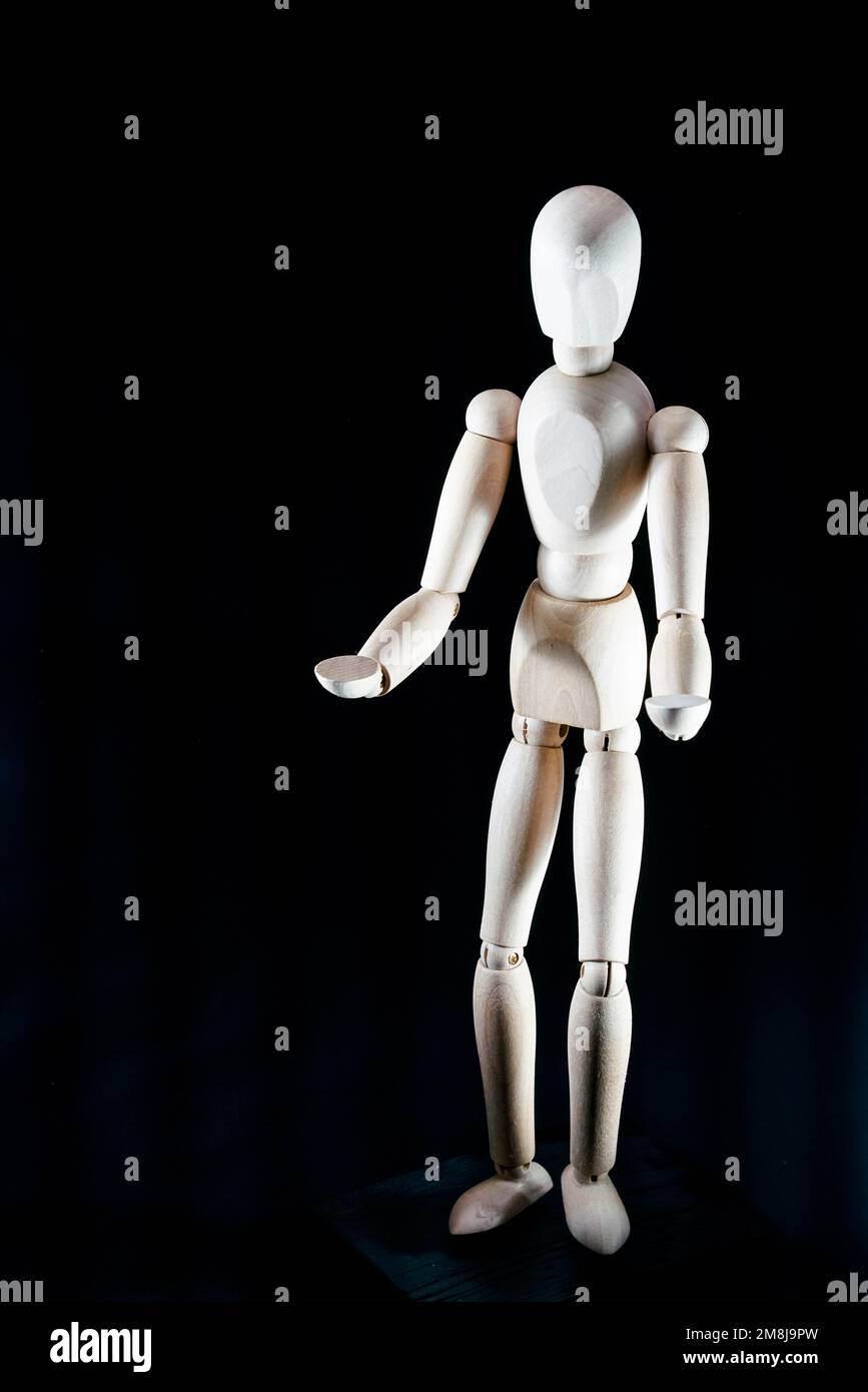 wooden dummy, puppet made of wood, art mennequin Stock Photo - Alamy