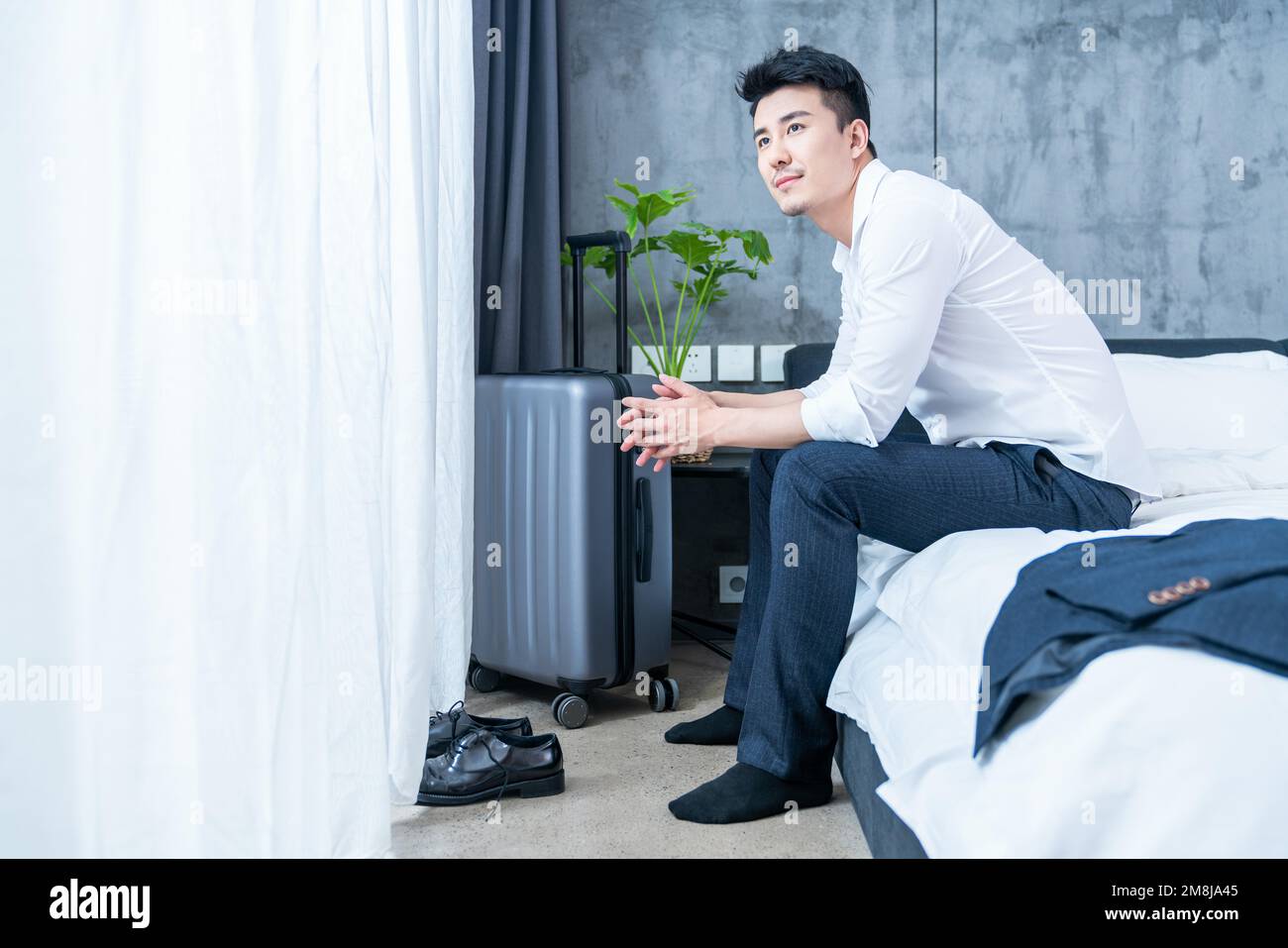 Business man in the hotel to rest Stock Photo - Alamy