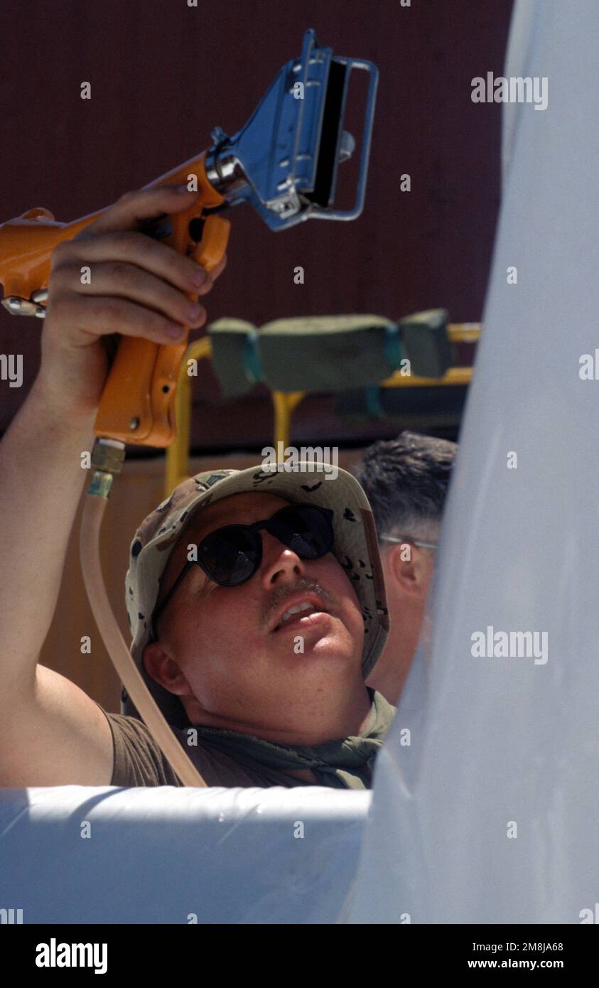 SGT. Tony Colby, from the 4th Aviation, Fort Carson, Colo, uses a ...
