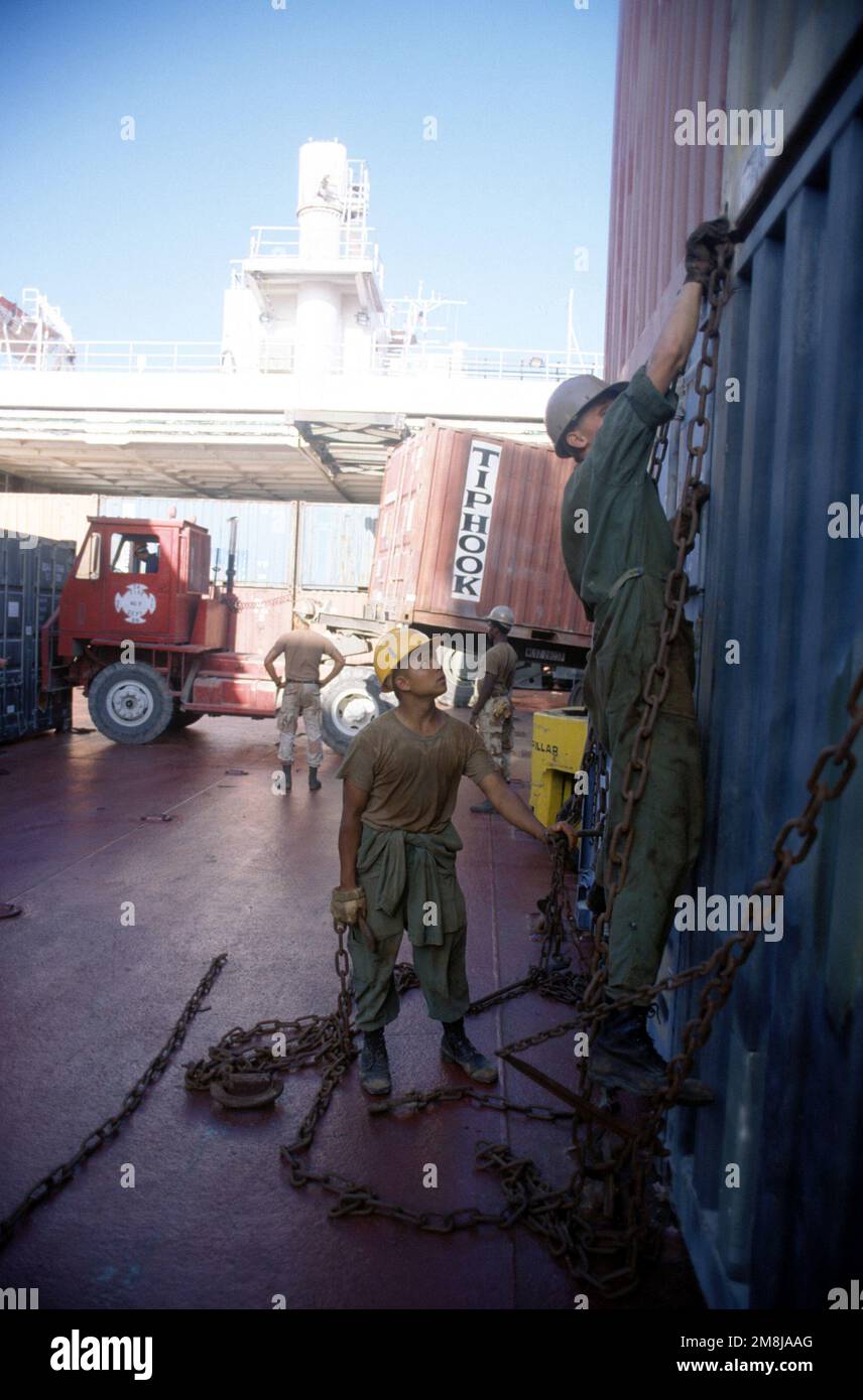 Soldiers from the 155th Transportation Company, Fort Eustis, VA, adjust ...
