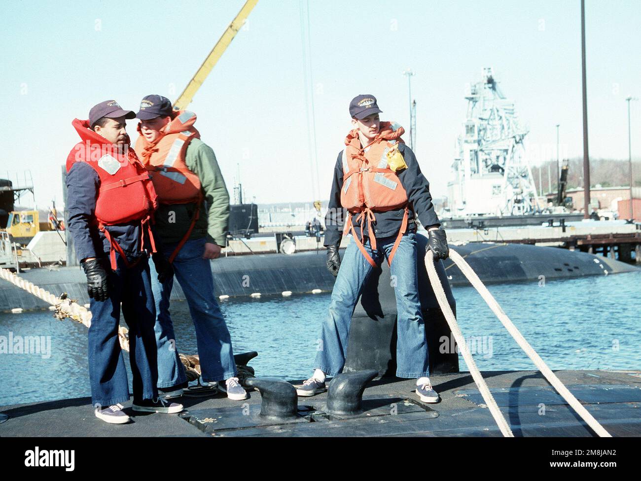Crewmen of the nuclear-powered attack submarine USS MINNEAPOLIS-SAINT ...