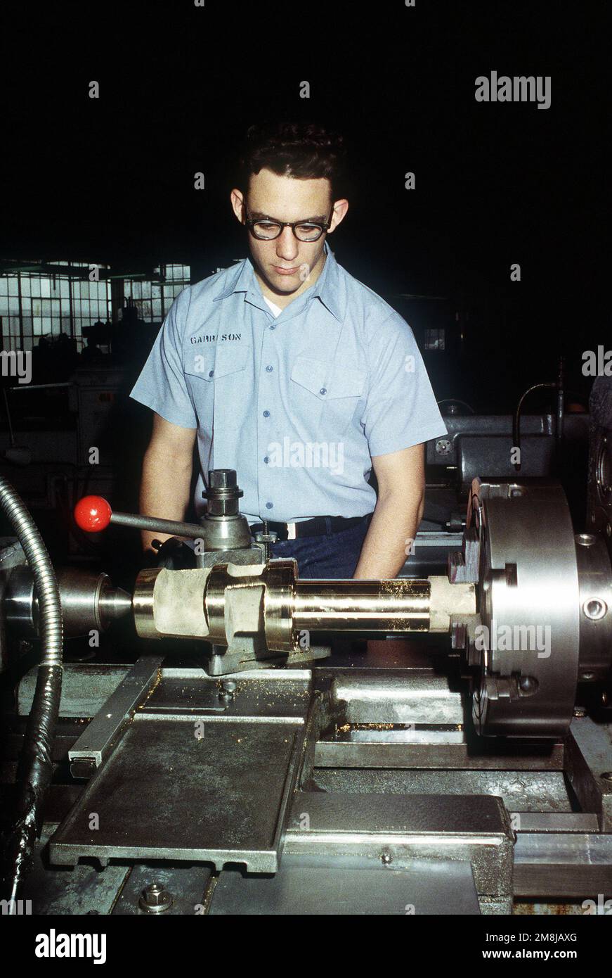 Machine Repairman Fireman Recruit (MRFR) Jeffery Garrison is shown ...