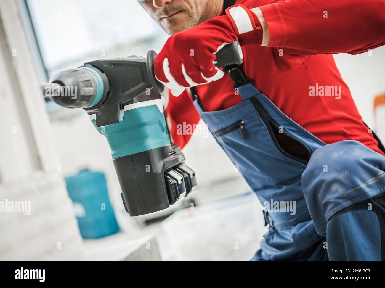 Concrete Hole Drilling by Construction Worker Using Professional Heavy ...