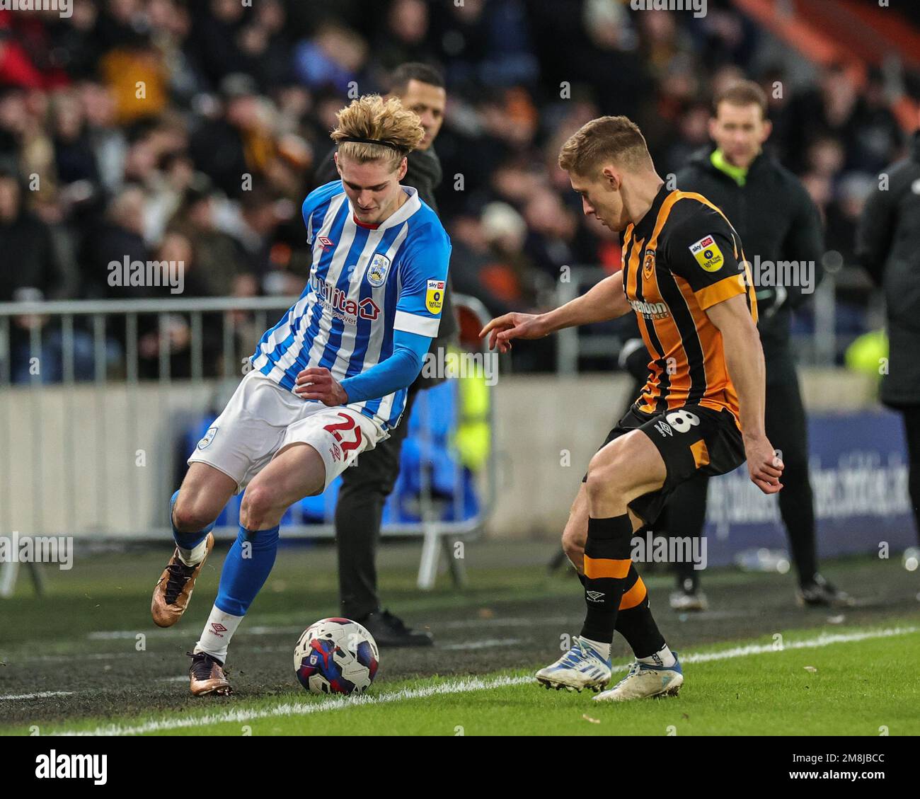 Jack Rudoni #22 of Huddersfield Town runs the ball out of play during ...