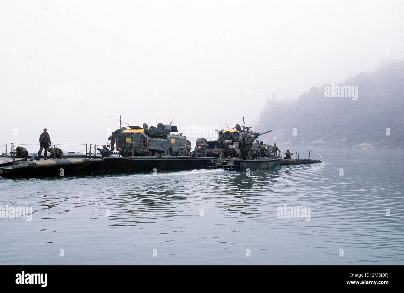 An assault floating bridge ferry moves part of a Republic of Korea ...