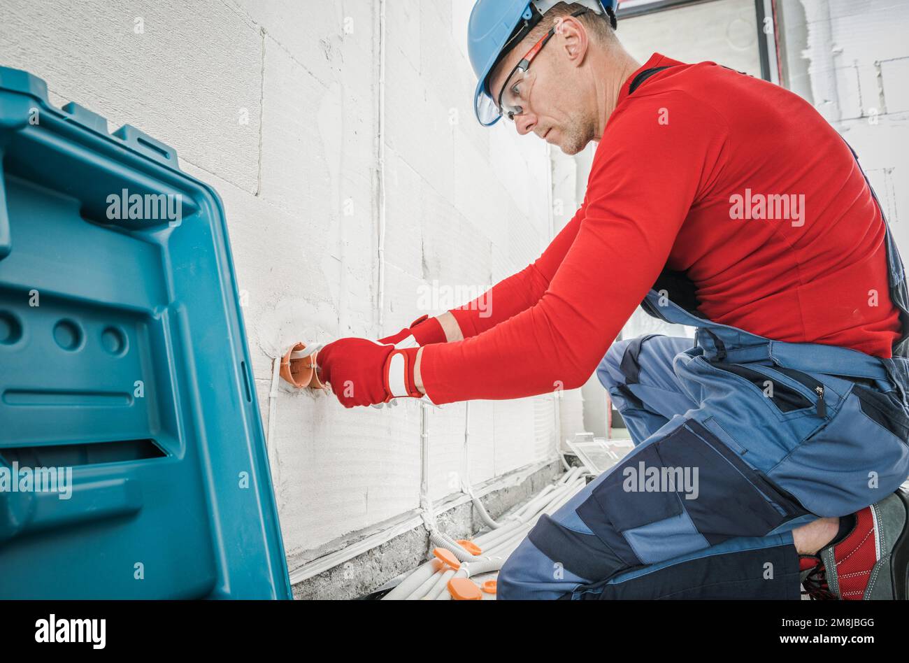 Professional Electrician Contractor Installing Electric Socket Inside ...