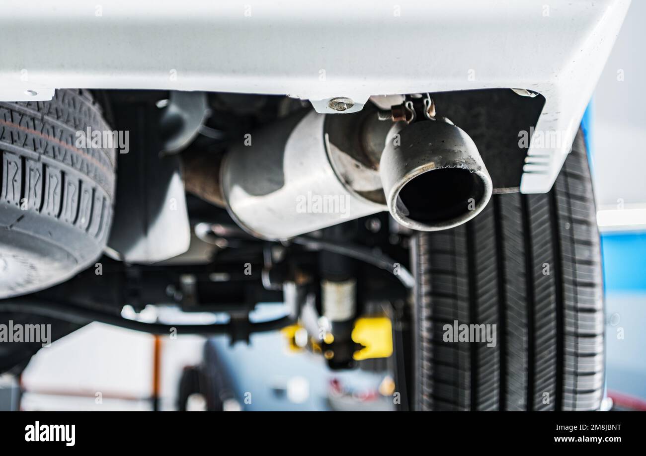 Car Muffler Pipe End Close Up. Vehicles Pollution Theme. Automotive ...